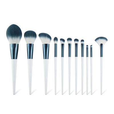 China 11 Pcs White Wooden Handle Makeup Brush Set Blue Synthetic Hair Blending Brush with Cotton Bag for sale