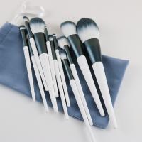China 11 Pcs White Wooden Handle Makeup Brush Set Blue Synthetic Hair Blending Brush with Cotton Bag for sale