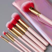 China 8 Piece Travel Makeup Brush Set Pink Wooden Handle Synthetic Hair with Rainbow Bag for sale