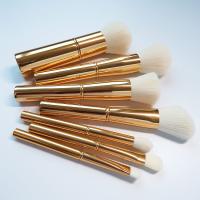 China 7-Piece Oval Makeup Brush Set High Gloss Gold Aluminum Handle Synthetic Hair for sale