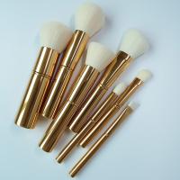 China 7-Piece Oval Makeup Brush Set High Gloss Gold Aluminum Handle Synthetic Hair for sale