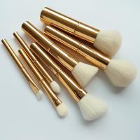 China 7Pcs Oval Makeup Brush Set Shiny Gold Aluminum Handle Cruelty Free Synthetic Bristles for sale