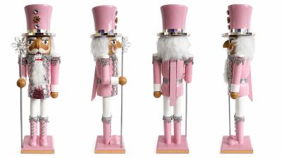 China Custom Pink Silver Feather Nutcracker for Christmas Display for sale