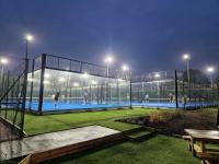 China Custom Outdoor Padel Court 20m x 10m Professional Competition Paddle Tennis Court with 12mm Tempered Glass for sale