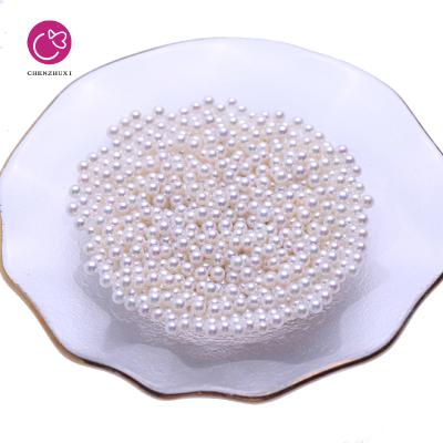 China Wholesale Natural Necklaces Loose Beads White Color Half Hole Freshwater Rice Pearl for Earrings for sale