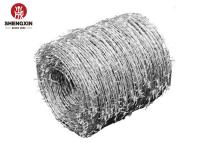 China Hot Dipped Galvanized 10mm Coiled Barbed Wire Roll   Higher Versatility for sale