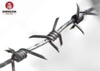 China 50kg Roll Razor Railway Galvanized Barbed Wire Rust Proof for sale