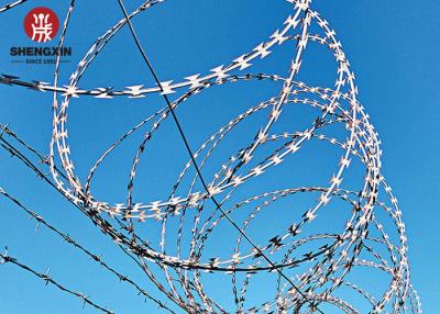China Concertina Hot Dipped Galvanized Iron Barbed Wire Razor Grey Coated for sale