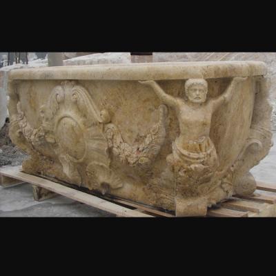 China Beige Travertine Carved Bathtub with Figure Statue for Hotel Bathroom Decoration 180x80cm for sale