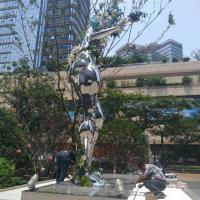China Mirror Polished Stainless Steel Man Sculpture 500cm Custom Size for Garden Decoration for sale