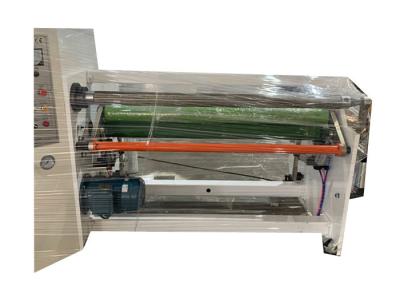 China 1000mm Non Adhesive Automatic Rewinding Machine with Servo Motor and PLC Tension Control for sale