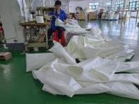 China Industrial Polyester Dust Collector Filter Bag 130-150°C with >1300N Strength for Cement Mining Applications for sale