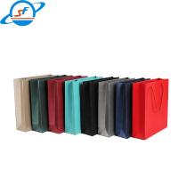 China New Custom Print Logo Gift High Quality Paper Bags Luxury Paper Shopping Bag With Ribbon Handle for sale