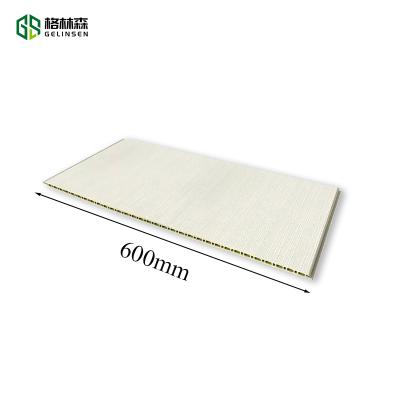 China 600mm Hollow Bamboo Wood Fiber PVC Decorative Wall Ceiling Panel for Villa Bedroom for sale