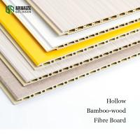 China 600mm Hollow Bamboo Wood Fiber PVC Decorative Wall Ceiling Panel for Villa Bedroom for sale