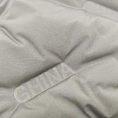 China 3D Seamless Stereo Embossed Polyester Winter Garment Down Fabric 150Cm 180G for sale