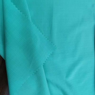 China Woven Dyed Ripstop 4 Way Stretch 140 G Sportswear Fabric 90% Polyester 10% Spandex for sale