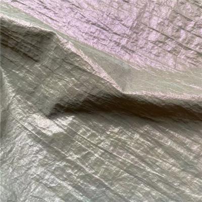 China 160GSM 150D 150D Winter Jacket Fabric Plain Reflective Polyester Fabric 1.5M for sale