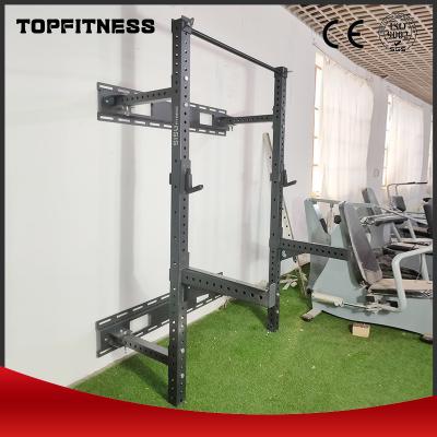 China Foldable Adjustable Power Rack Exercise Squat Rack Wall Mounted Fold Back Squat Customized for sale