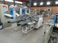 China 220V Double Head Napkin Tissue Paper Bundle Packing Machine 14-18bags/minute for sale