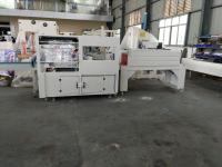 China Good Price Maxi Roll Automatic Toilet Tissue Paper Shrink Packing Machine for sale