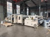 China Automatic Toilet Tissue Paper Rewinding Machine With Glue Lamination for sale