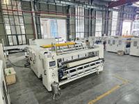 China Newest double perforating blade toilet paper/maxi towel roll rewinding machine for sale