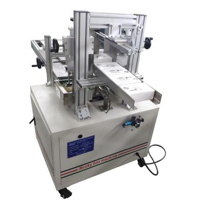 China Easy operation carton box facial tissue paper sealing machine price for sale