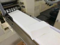 China Xinyun Automatic Vacuum Folding Napkin Paper Machine 180mm Width 700mm Diameter for sale