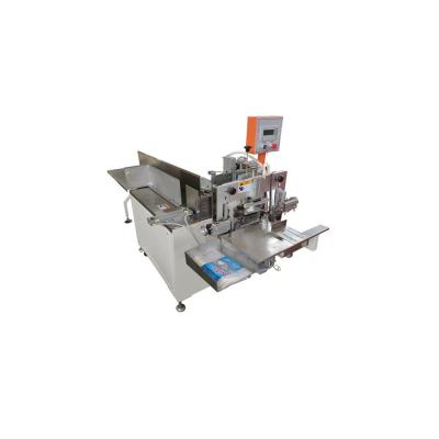 China Xinyun Semi Automatic Tissue Paper Packing Machine 220V 2.2kW Handwheel Adjustable Size for sale