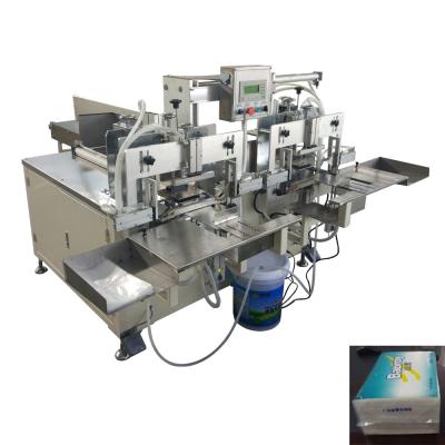 China Xinyun PE Bag Tissue Paper Packaging Machine 0.5MPa 220V Napkin Packing for sale