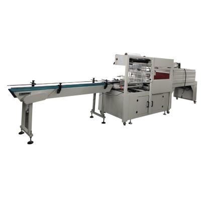 China 1.35kw Automatic Shrink Wrap Sealer Machine for Carton Box Maxi Roll Paper 220V for sale