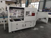 China 1.35kw Automatic Shrink Wrap Sealer Machine for Carton Box Maxi Roll Paper 220V for sale