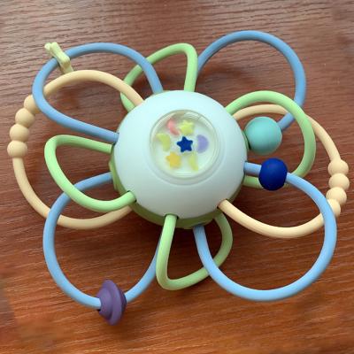 China Food Grade Silicone Baby Teether Rattle Toy 12 Gnawing Points BPA Free for 3+ Months for sale