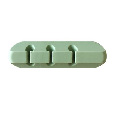 China Custom Silicone 3-Hole Cable Clamp Jumper Manager for Data and Headphone Cords 70x20x13mm for sale