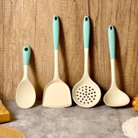 China Food Grade Silicone Kitchen Utensils Set 4 Piece Non Stick Spoon Shovel Strainer Rice Spoon High Temperature Resistant for sale
