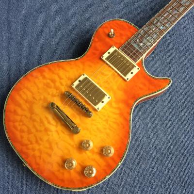 China Custom LP Electric Guitar Flame Maple Top Mahogany Body 22 Fret Gold Hardware for sale