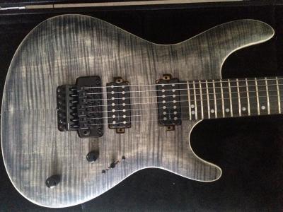 China Custom 7 Strings Electric Guitar Flamed Maple Floyd Rose Bridge 24 Frets Mahogany Body for sale
