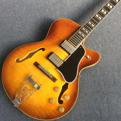 China Hollow Body Jazz Electric Guitar 22 Fret Mahogany Body Ebony Fingerboard Chocolate Color with Tremolo for sale