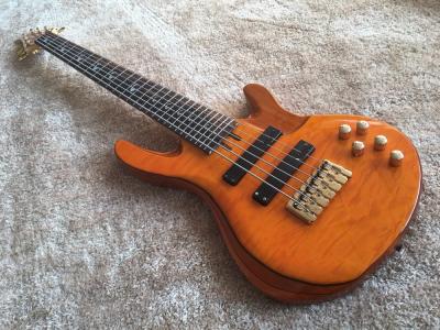 China 6 String Bass Guitar JP2 Yellow Quilted Maple Body Active Pickups Golden Bridges Tuner Alder for sale