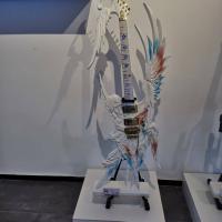 China Custom Handcarved Angel Electric Guitar White LED Light 6 String Unique One Piece for sale
