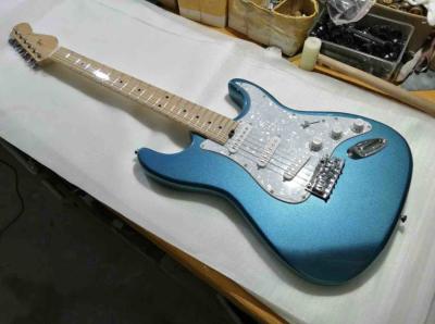 China Metal Blue Solid Body Electric Guitar with White Pickguard Maple Fretboard 22 Frets for sale