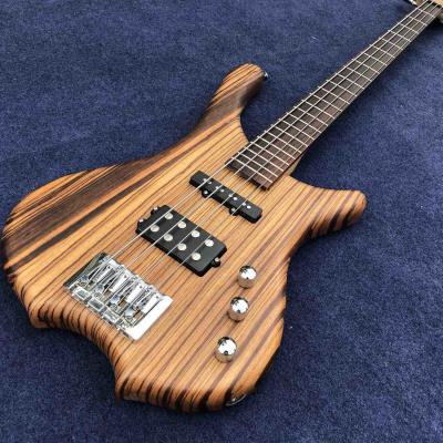 China 4 Strings Buzzard Bass Guitar Natural Color Neck Through 22 Fret Mahogany Neck for sale