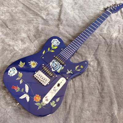 China Handmade Electric Guitar with Blue Fingerboard and Hand-Painted Flowers Maple Body 22 Frets for sale