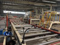 China Automatic PVC Lamination Machine for Gypsum Board with 1300mm Effective Laminating, PLC System, and 2-6 Million Sq.m/year Capacity for sale