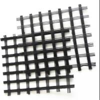 China Onsite Inspection Bitumen Coated Fiberglass Biaxial Geogrid for Road Pavement Yellow for sale
