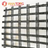 China 12.7*12.7mm 25.4*25.4mm Mesh Size Bitumen Coated Fiberglass Geogrid for Asphalt Road for sale