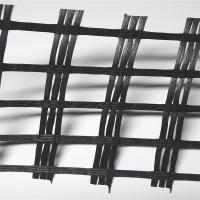 China 12.7*12.7mm 25.4*25.4mm Mesh Size Bitumen Coated Fiberglass Geogrid for Asphalt Road for sale