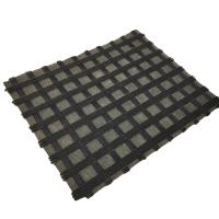 China Road Reinforcement 100-100kn Fiberglass Geogrid Composited with 50g Nonwoven Fabric for sale