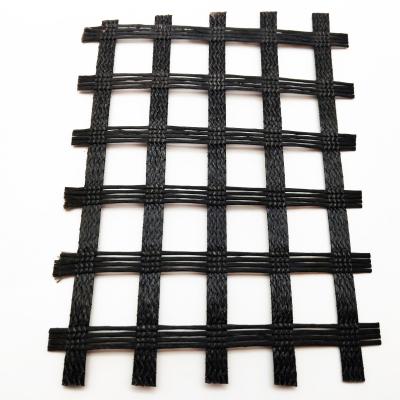 China Bitumen Coating Road Paving Material Fiberglass Geogrid with Mesh Size 12.7*12.7mm for sale